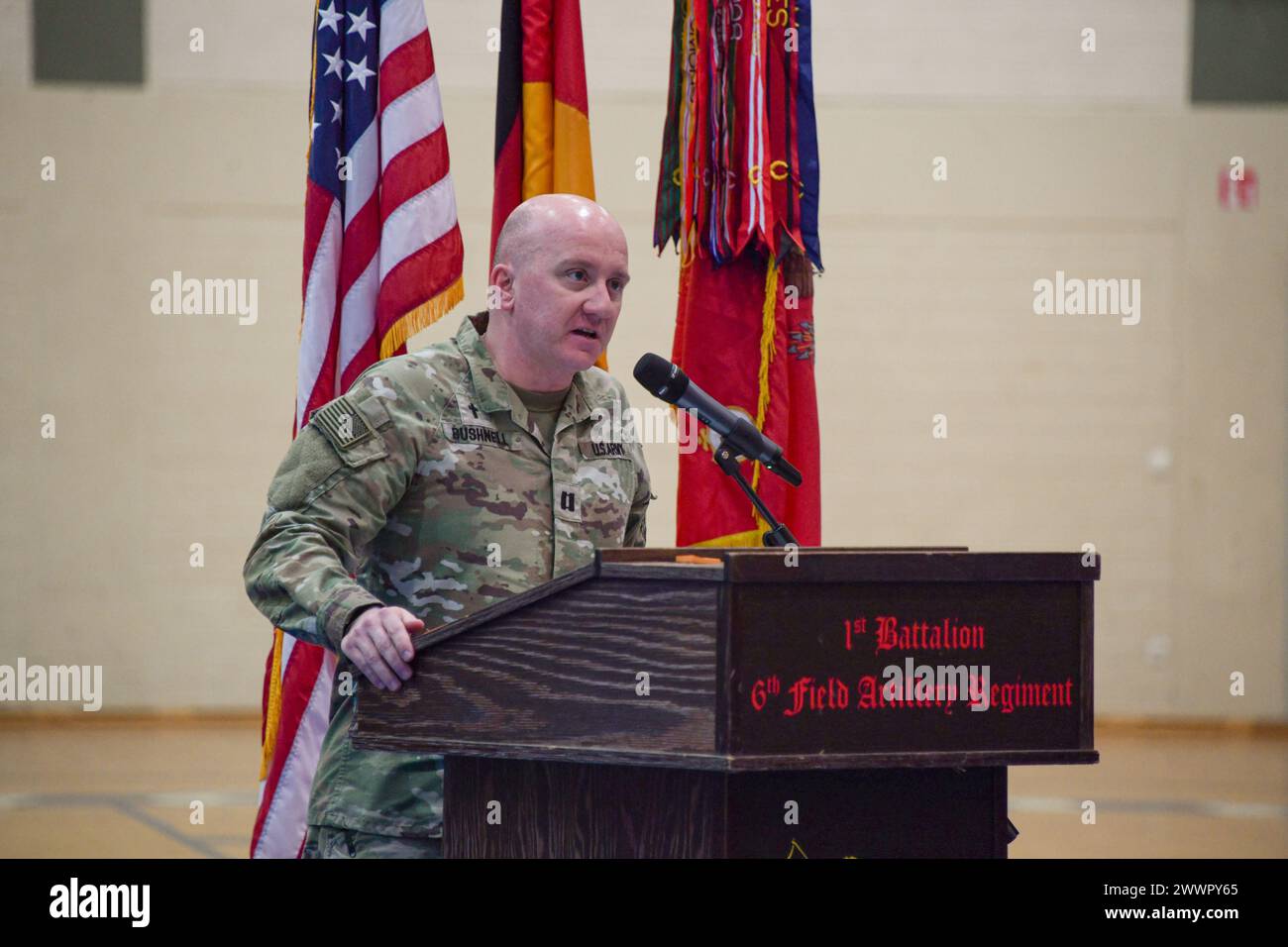 U.S. Army Chaplin Capt. Alan Bushnell gives an invocation during the ...