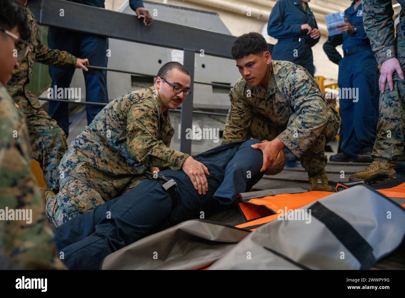 U.S. Marine Corps Lance Cpl. Joseph Lindell, center left, and Cpl ...