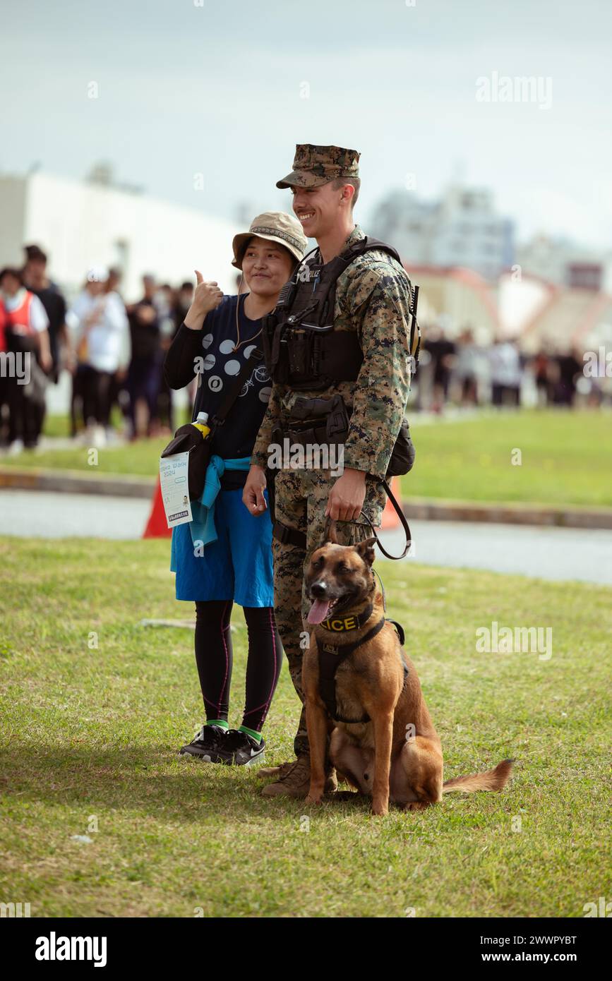 U.S. Marine Corps Cpl. Dylan Fowler, a military working dog handler ...