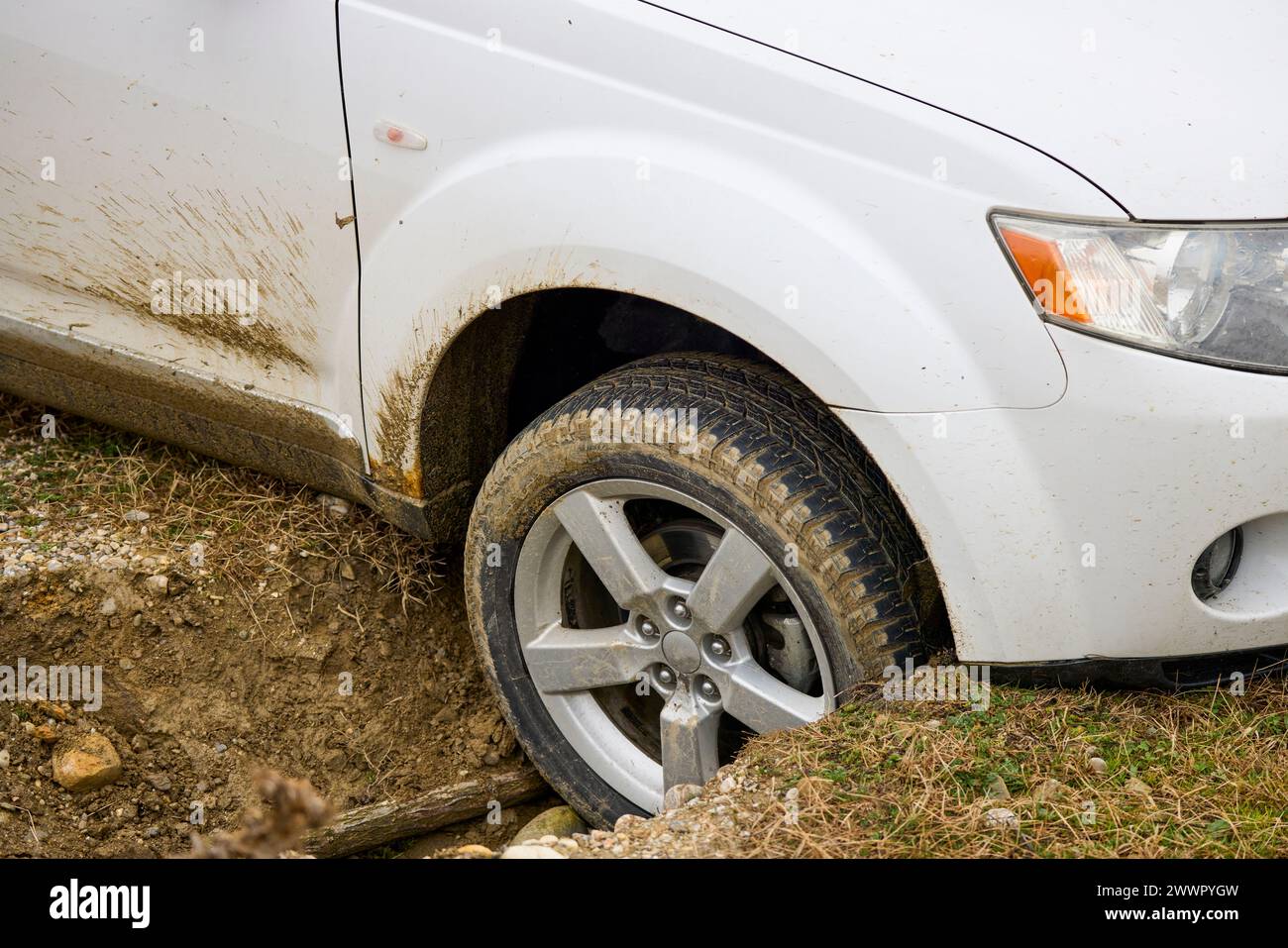 Off road SUV car crashed into a ditch on a track course Stock Photo - Alamy
