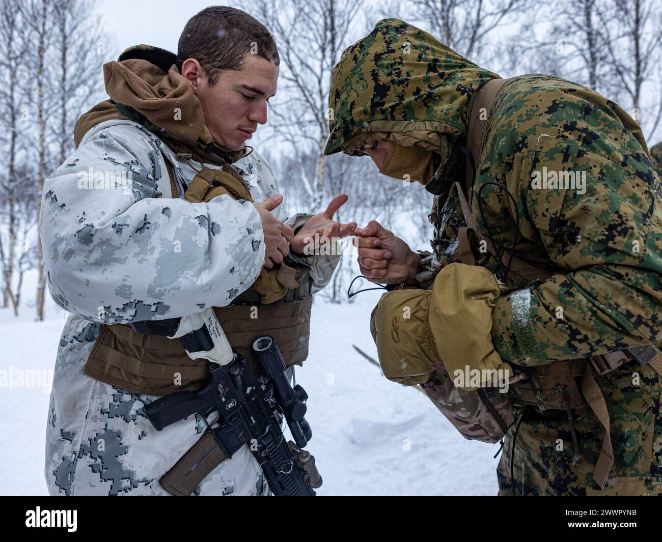 U.S. Marine Corps Sgt. Austin Lopez, a machine gunner and a NATO Winter ...