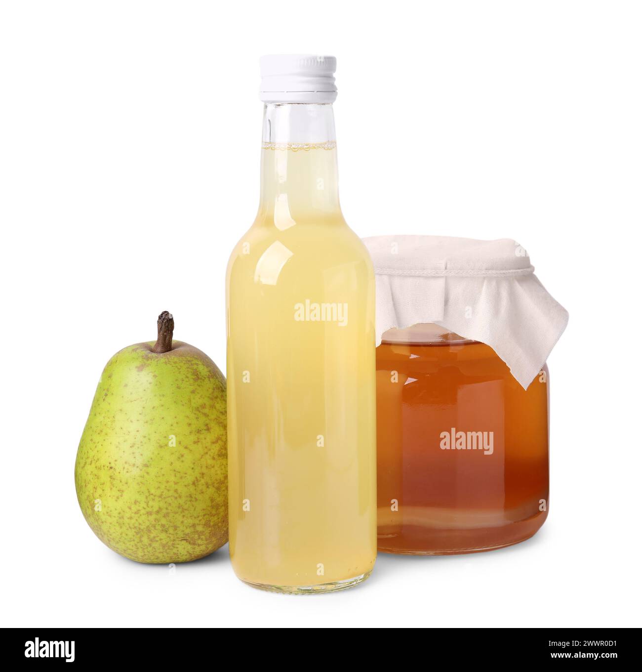 Delicious kombucha in glass bottle, jar and pear isolated on white ...