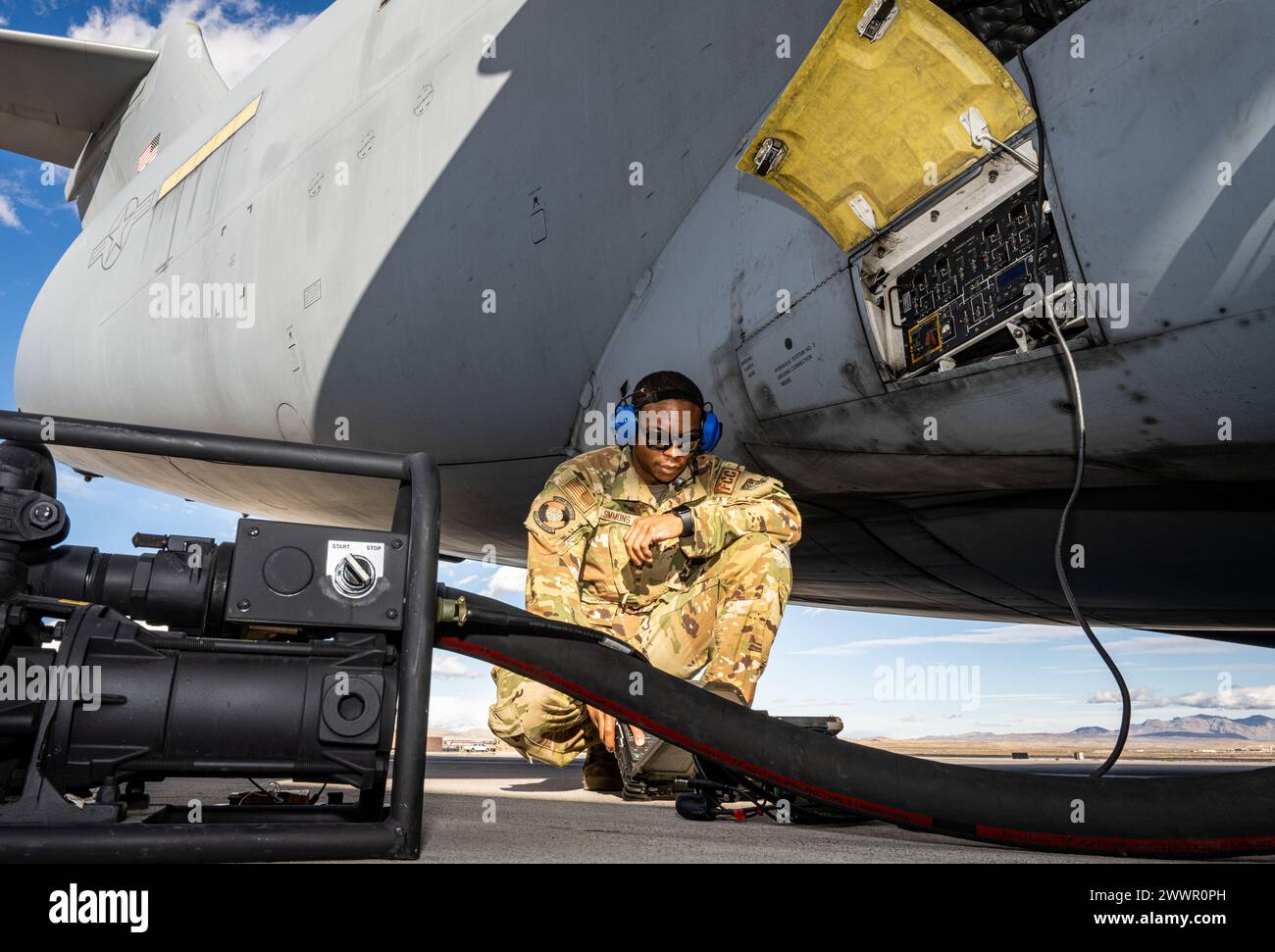 U.S. Air Force Staff Sgt. Dwayne Simmons, a flying crew chief with the ...