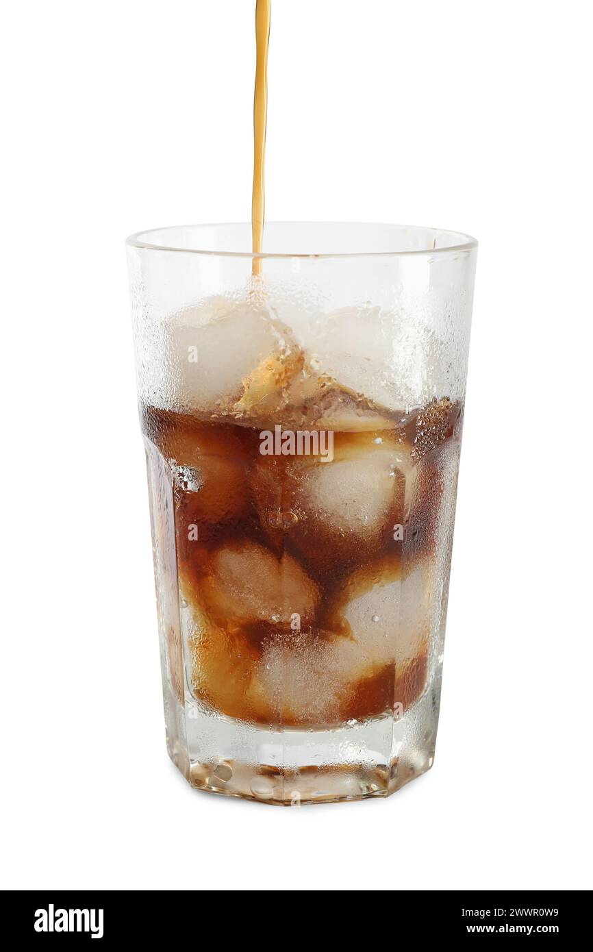Pouring coffee into glass of ice cubes on white background Stock Photo ...