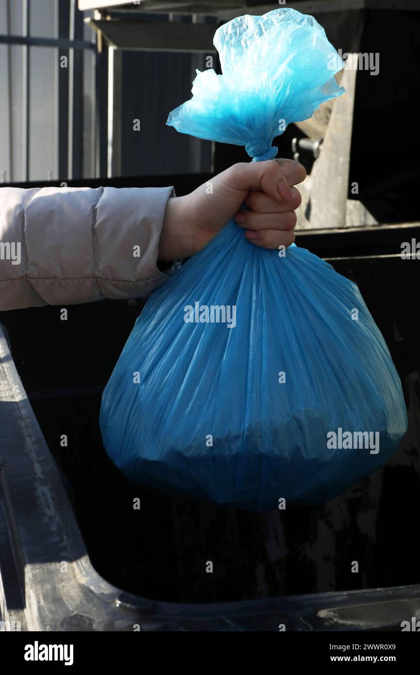 Garbage bag throwing in the bin hi-res stock photography and images - Alamy