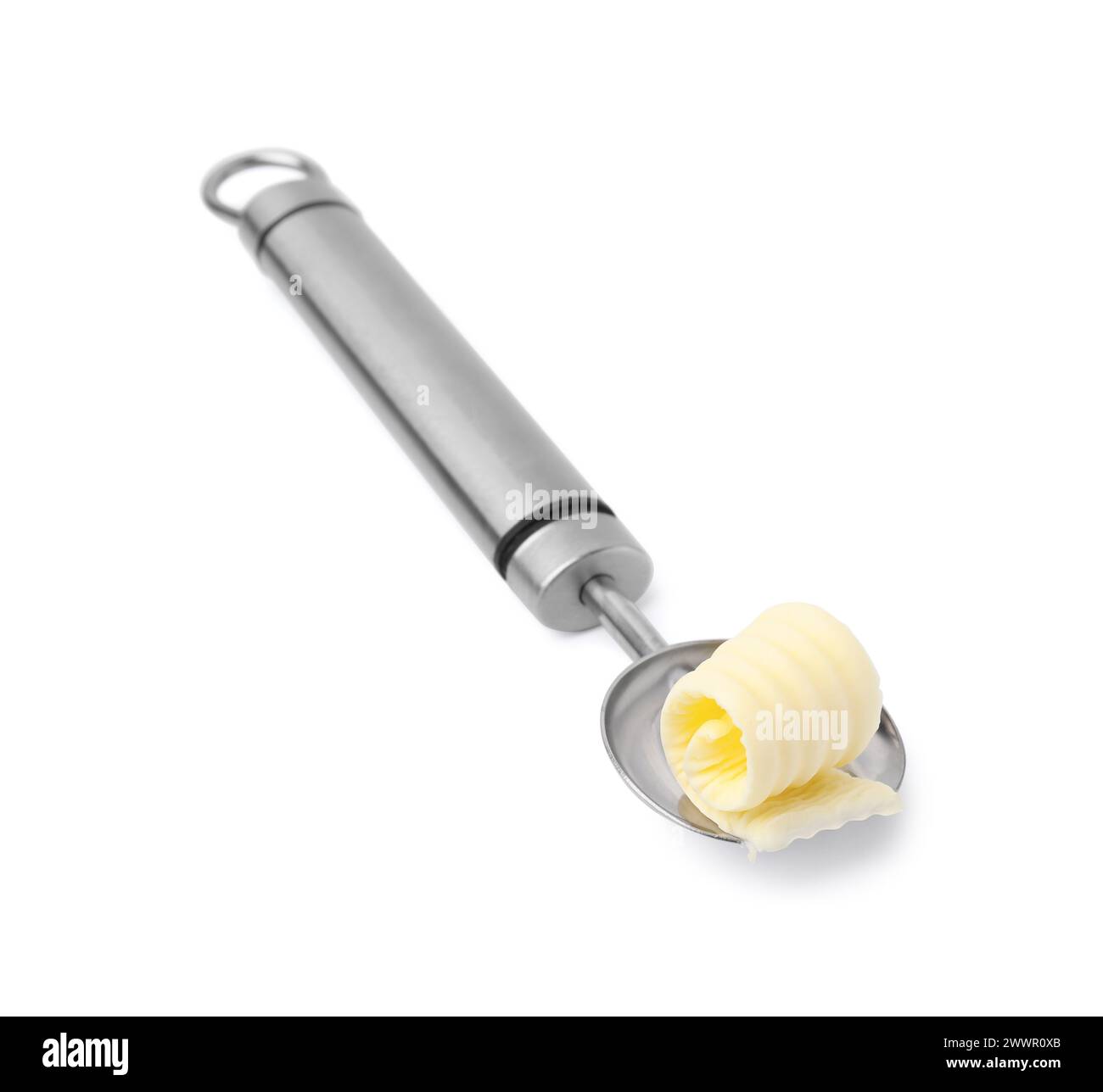 Butter curl in spoon isolated on white Stock Photo - Alamy