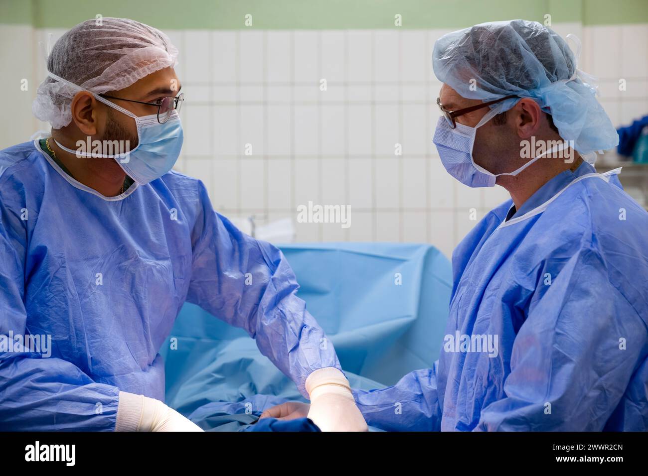 Dr. Kiran Banwari, surgery resident, left, and U.S. Air Force reservist ...