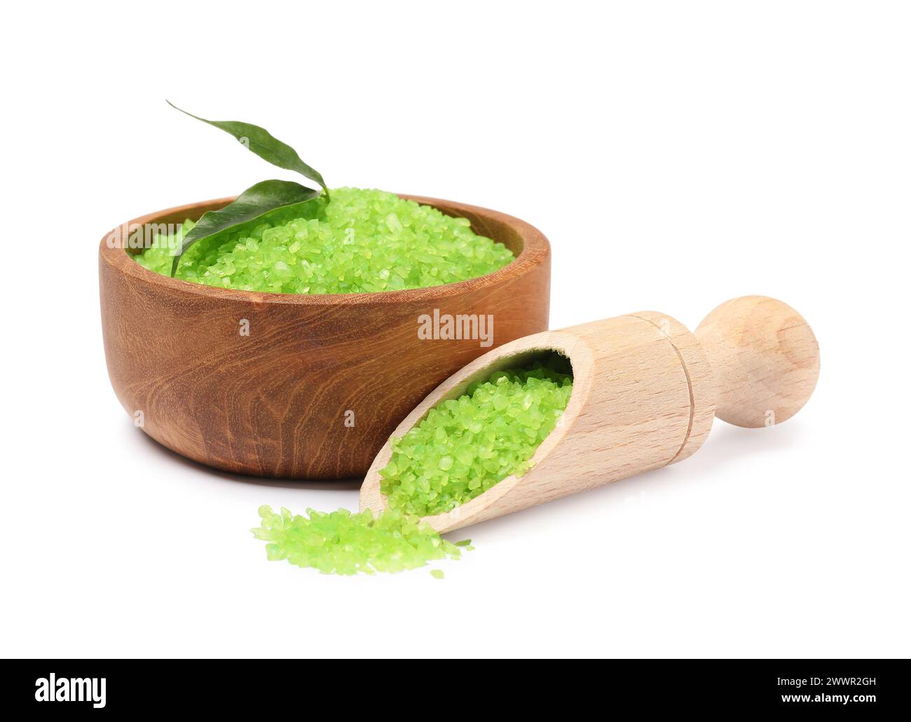 Green sea salt in bowl, scoop and leaves isolated on white Stock Photo ...