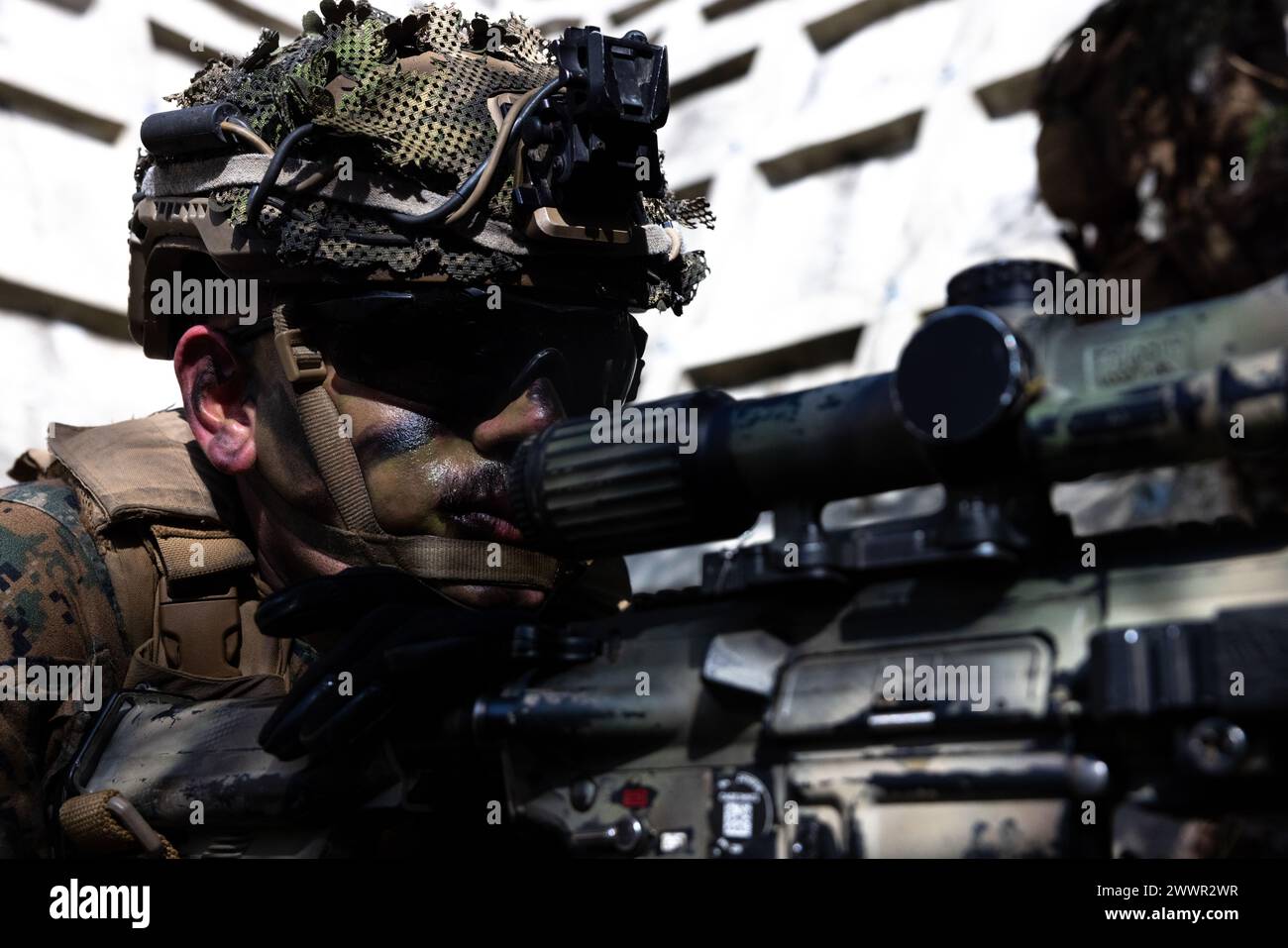 U.S. Marine Corps Sgt. Cade Gutierrez sets security during bridge ...