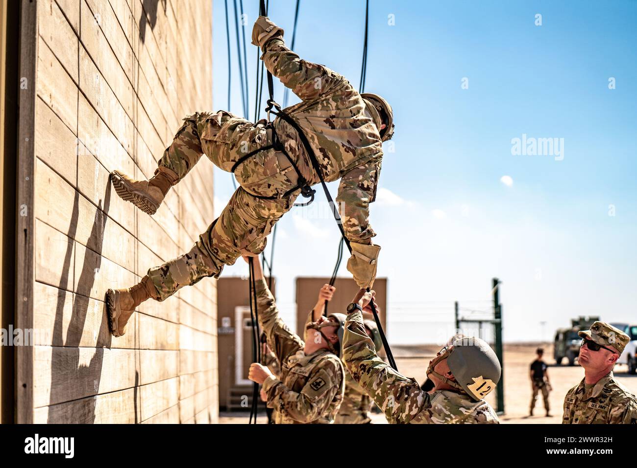Air Assault candidates rappel off the rappel towers on Camp Buehring ...