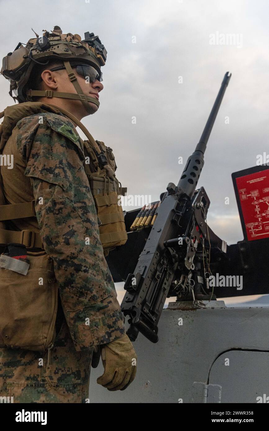 U.S. Marine Corps Lance Cpl. Seth Moore, a machine gunner assigned to ...