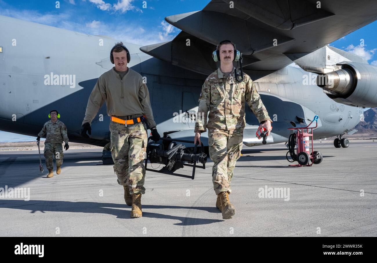 U.S. Air Force Tech. Sgt. Kyle Griffioen (left), an aerospace ...