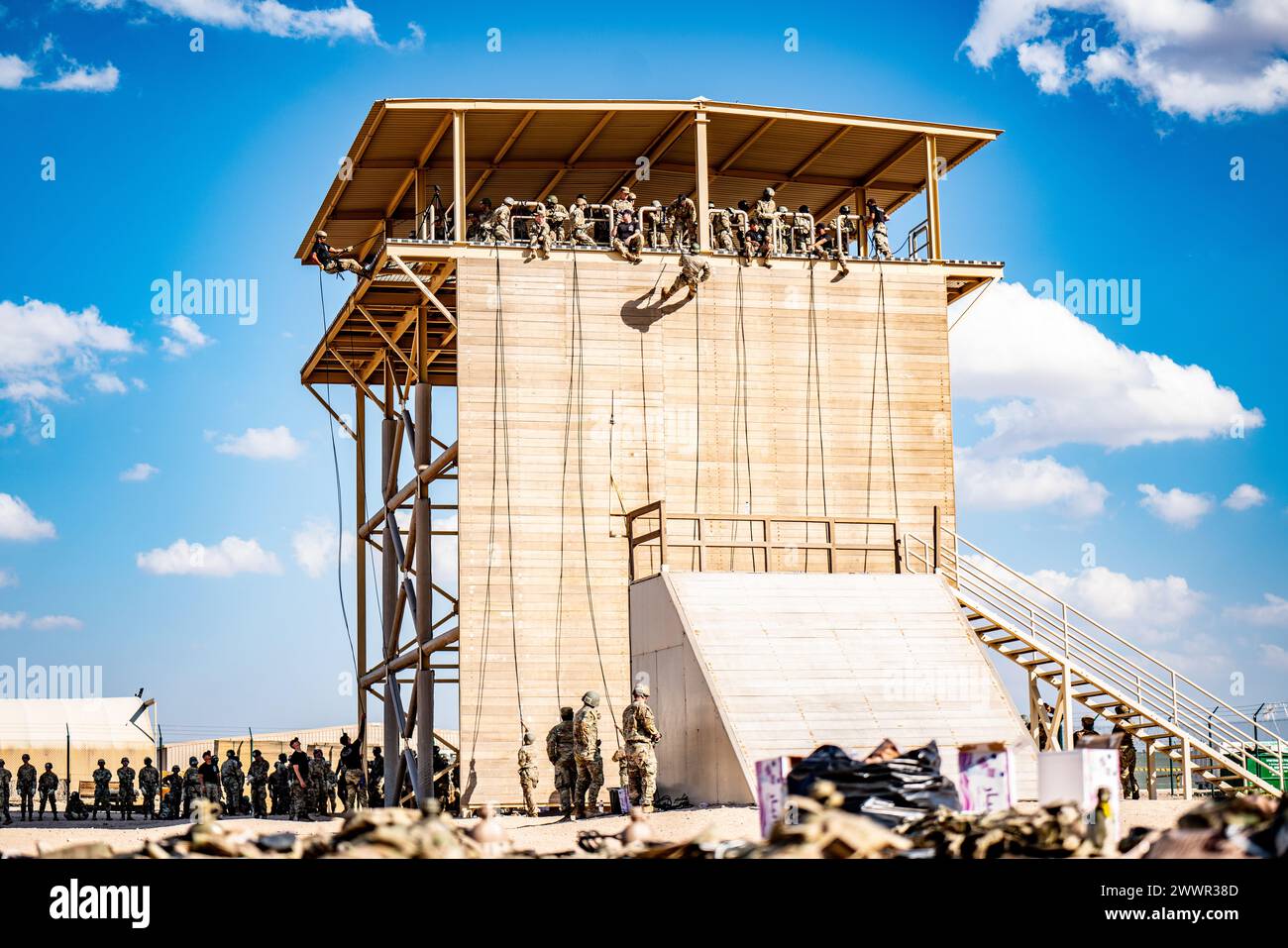 Air Assault candidates rappel off the rappel towers on Camp Buehring ...