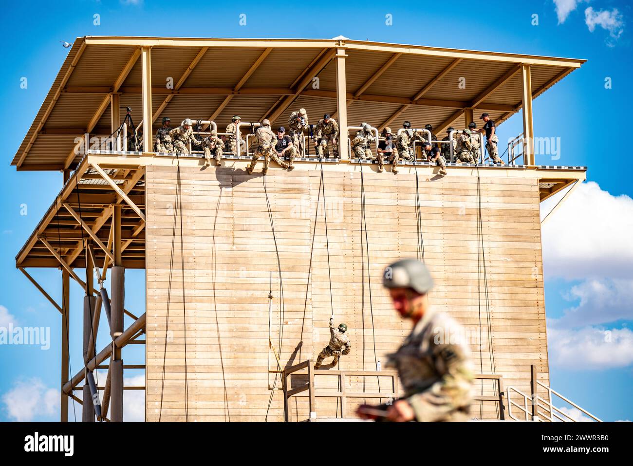 Air Assault candidates rappel off the rappel towers on Camp Buehring ...