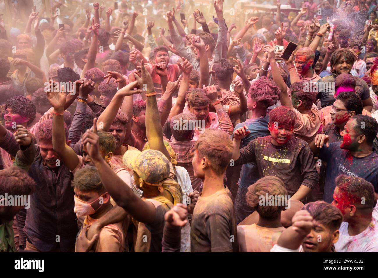 Guwahati, Assam, India. 25th Mar, 2024. Revellers dancing in the beat ...