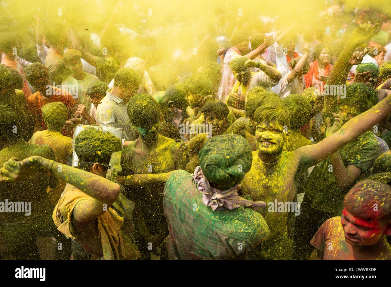 Guwahati, Assam, India. 25th Mar, 2024. Revellers dancing in the beat ...