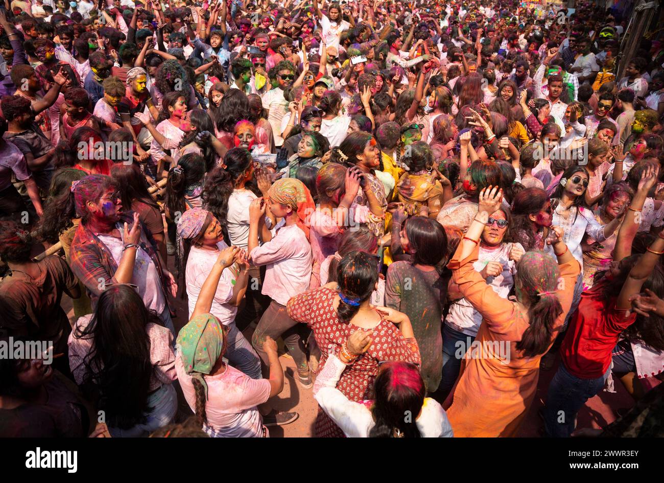Guwahati, Assam, India. 25th Mar, 2024. Revellers dancing in the beat ...
