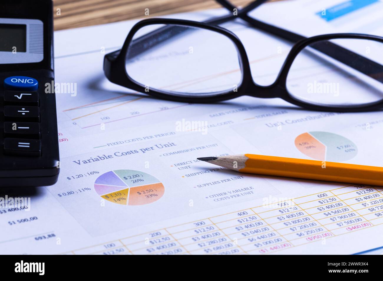 Graphs and Calculator Stock Photo - Alamy