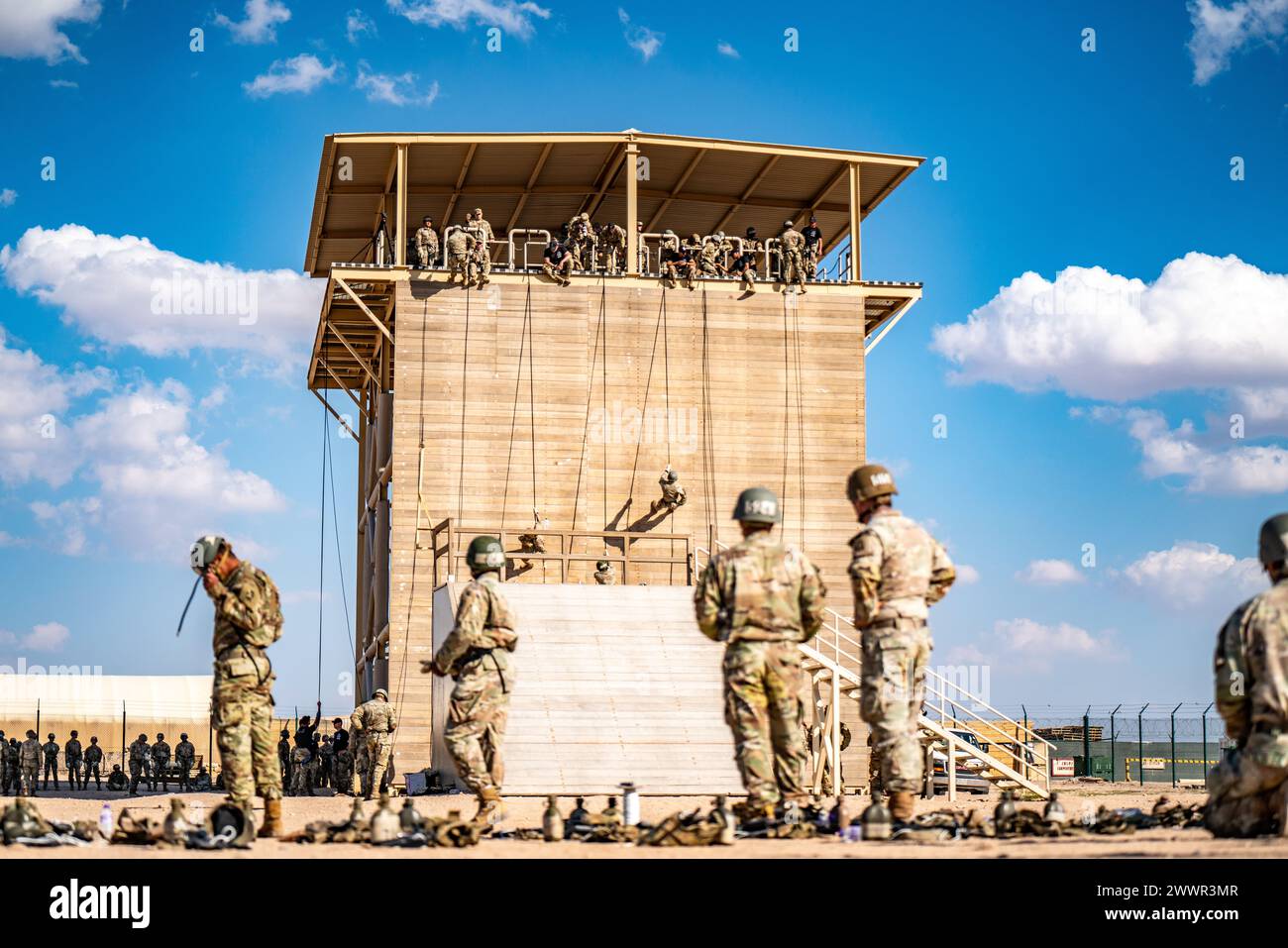 Air Assault candidates rappel off the rappel towers on Camp Buehring ...