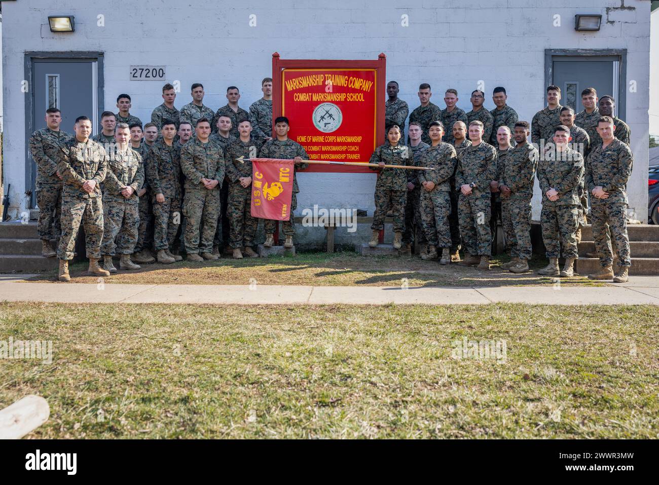 U.S. Marines with the Marksmanship Training Company pose for a group ...