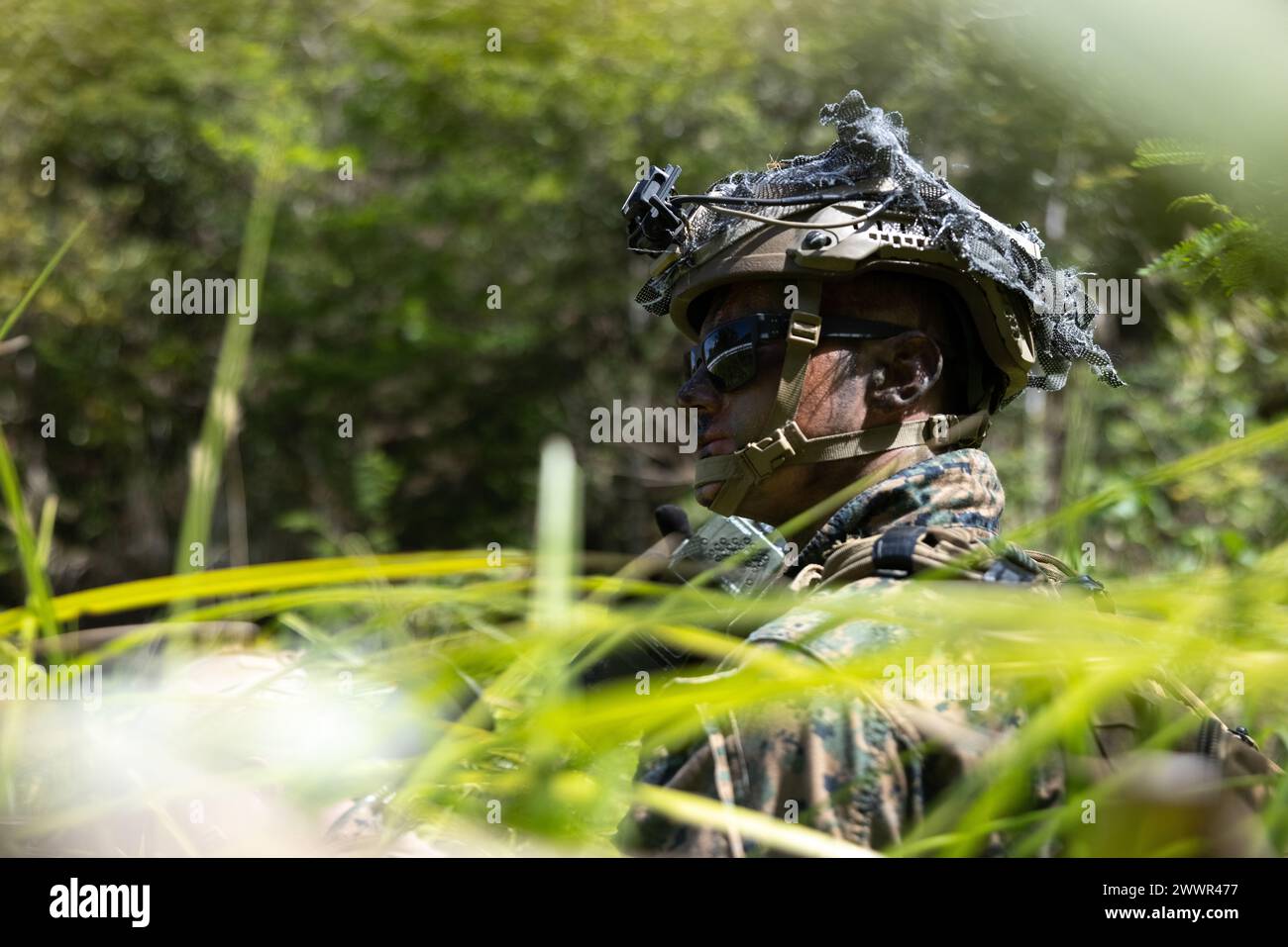 U.S. Marine Corps Sgt. Logan Elkins holds secturity during a bridge demolition training at the ...