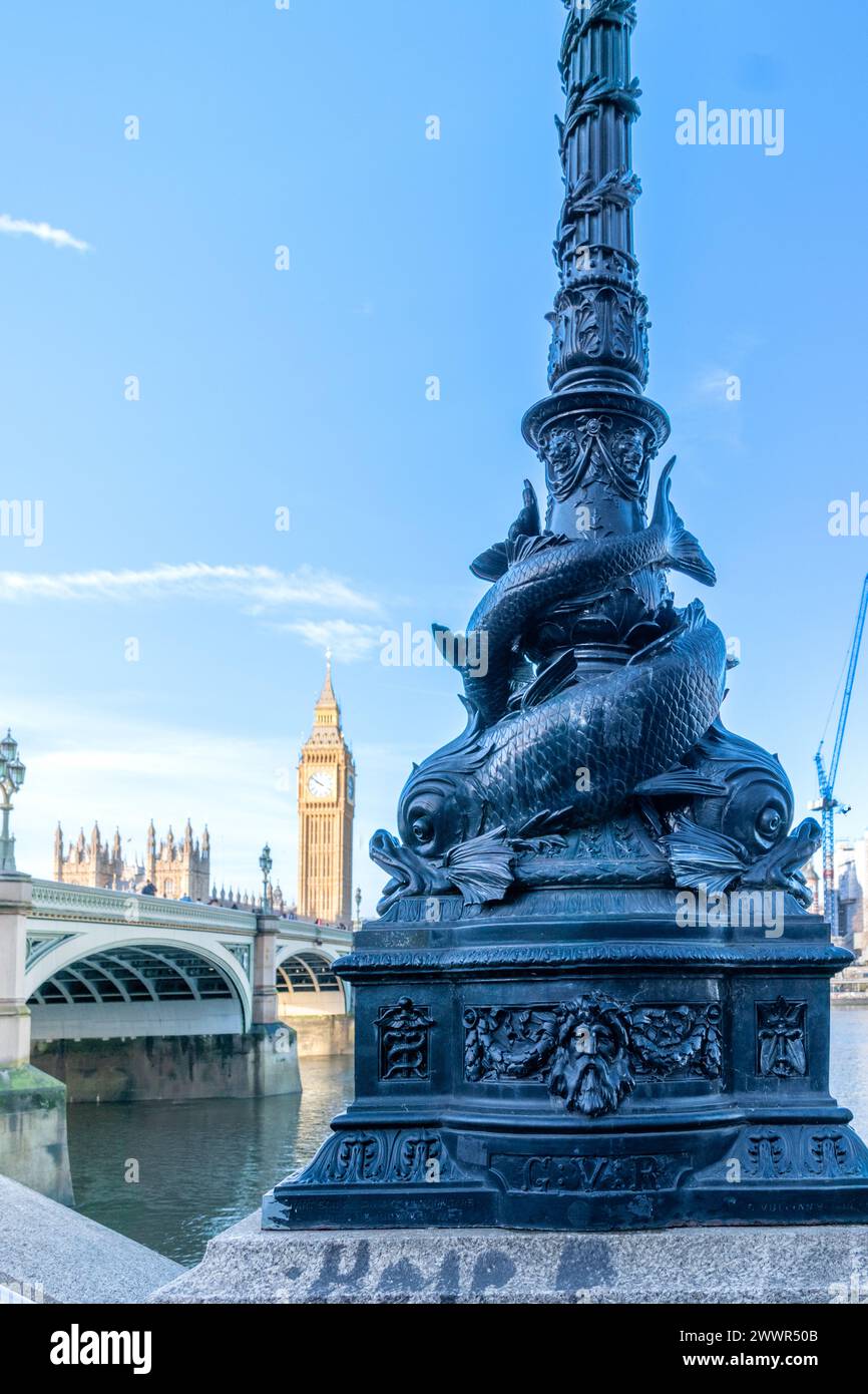 Fish lamp post on Thames Embankment with Big Ben and Westminster Bridge ...