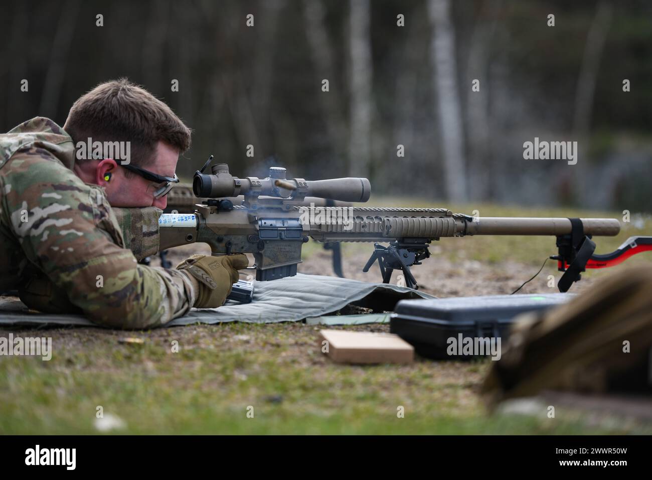 A U.S. Soldier assigned to 4th Squadron, 2nd Cavalry Regiment fires his ...