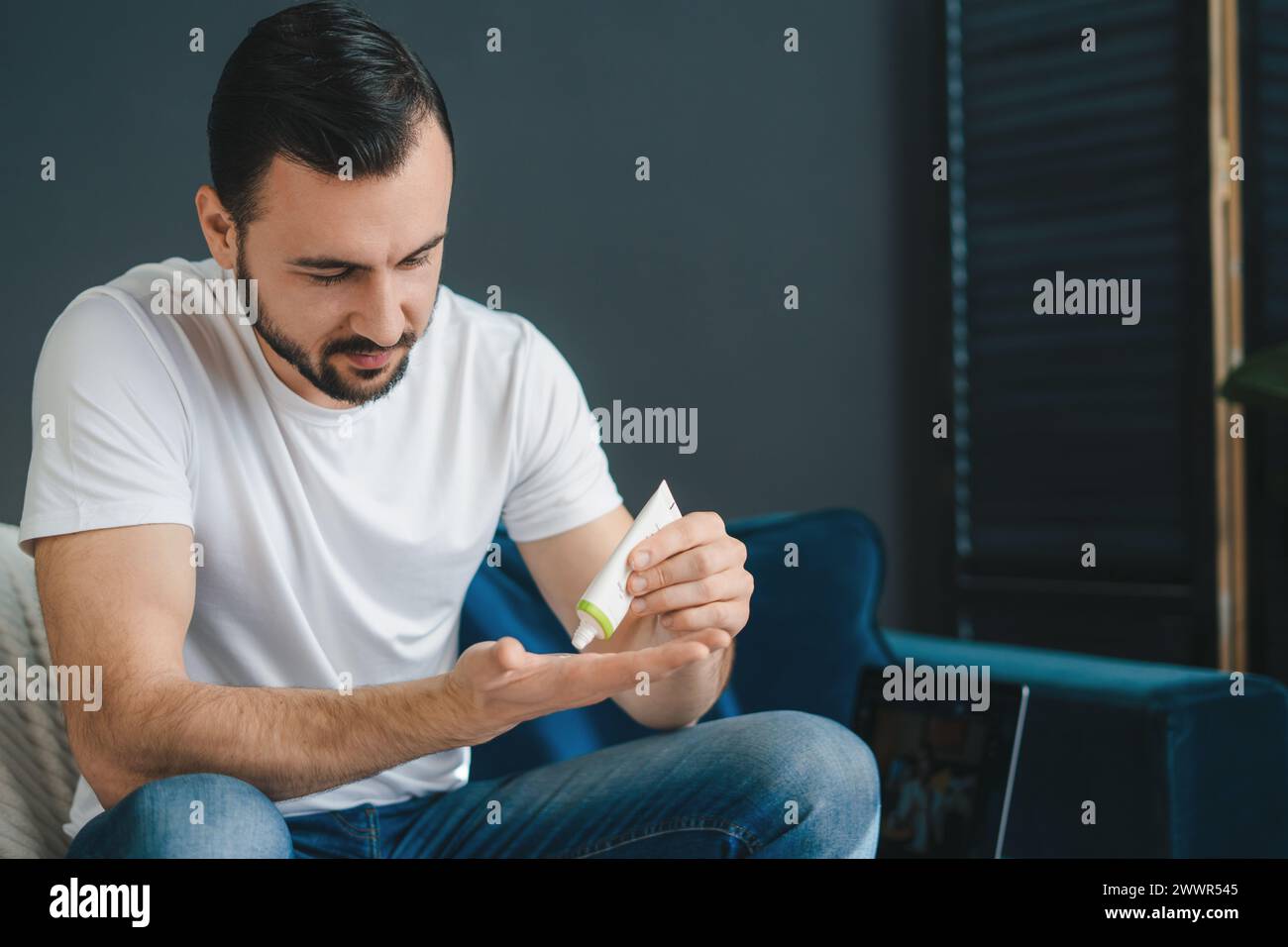 Pouring moisturizing cream on man hi-res stock photography and images ...
