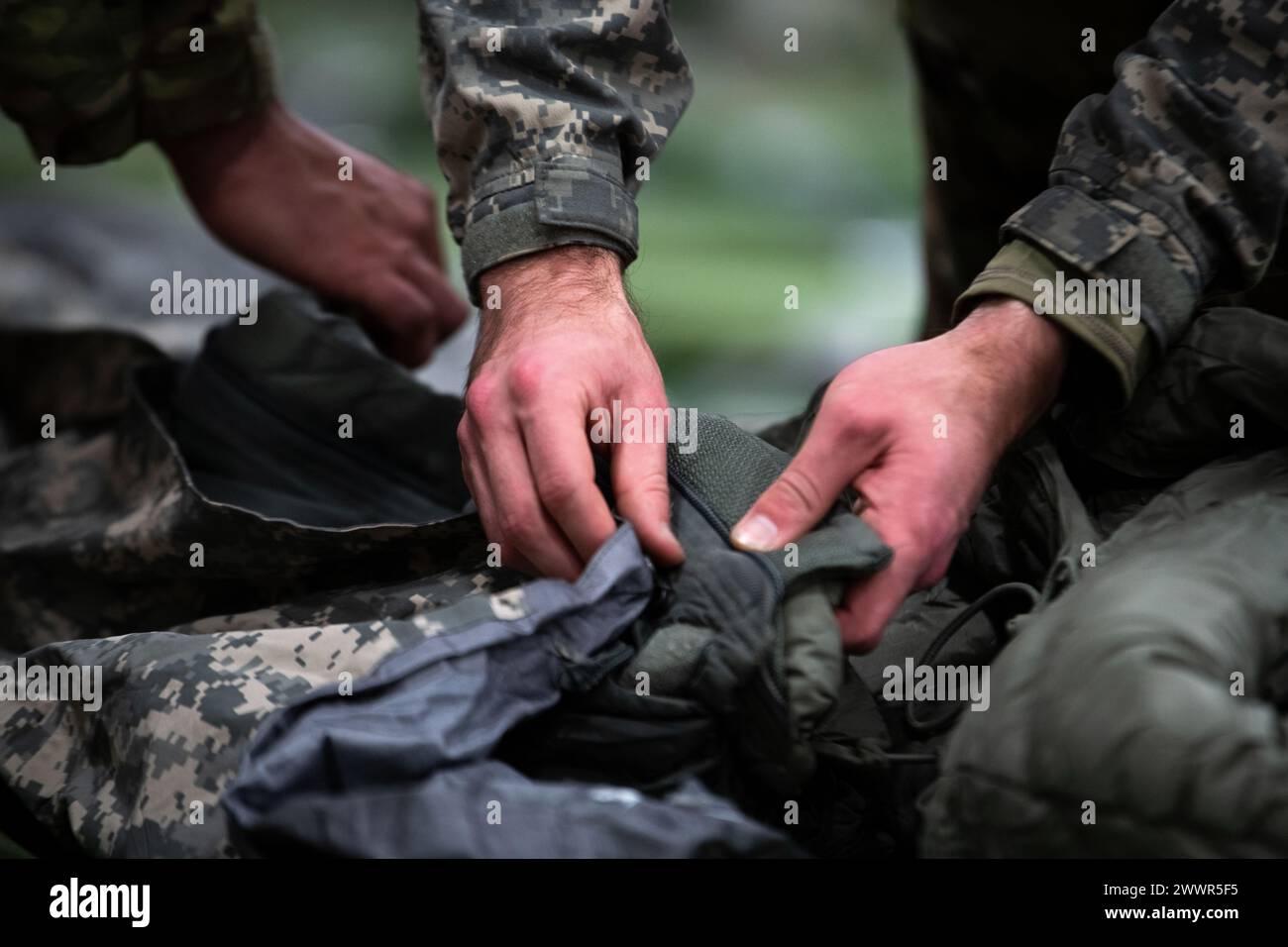 A U.S. Army Soldier secures his ruck after completing the cold weather ...