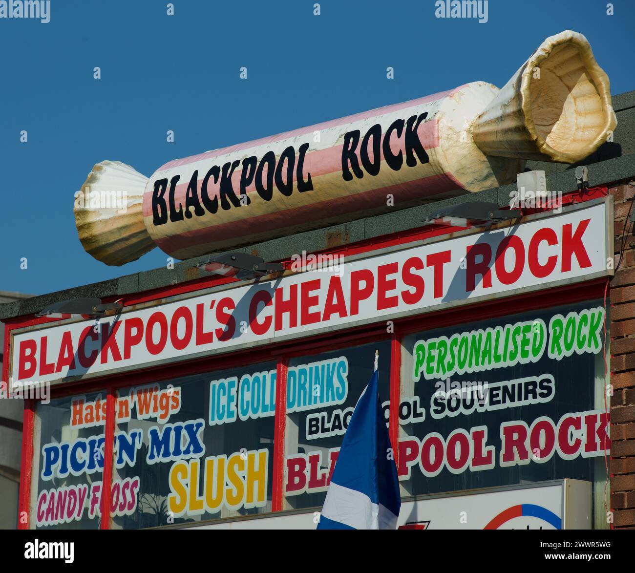 Closed shop in high street of a costal town of Blackpool, colourful ...