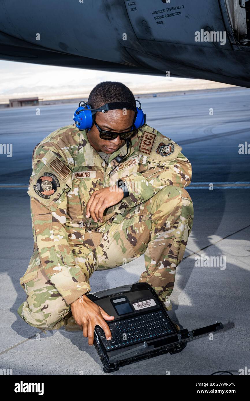 U.S. Air Force Staff Sgt. Dwayne Simmons, a flying crew chief with the ...