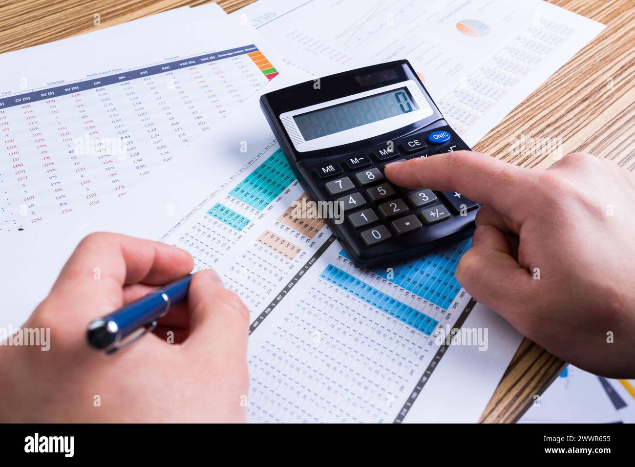 Graphs and Calculator Stock Photo - Alamy