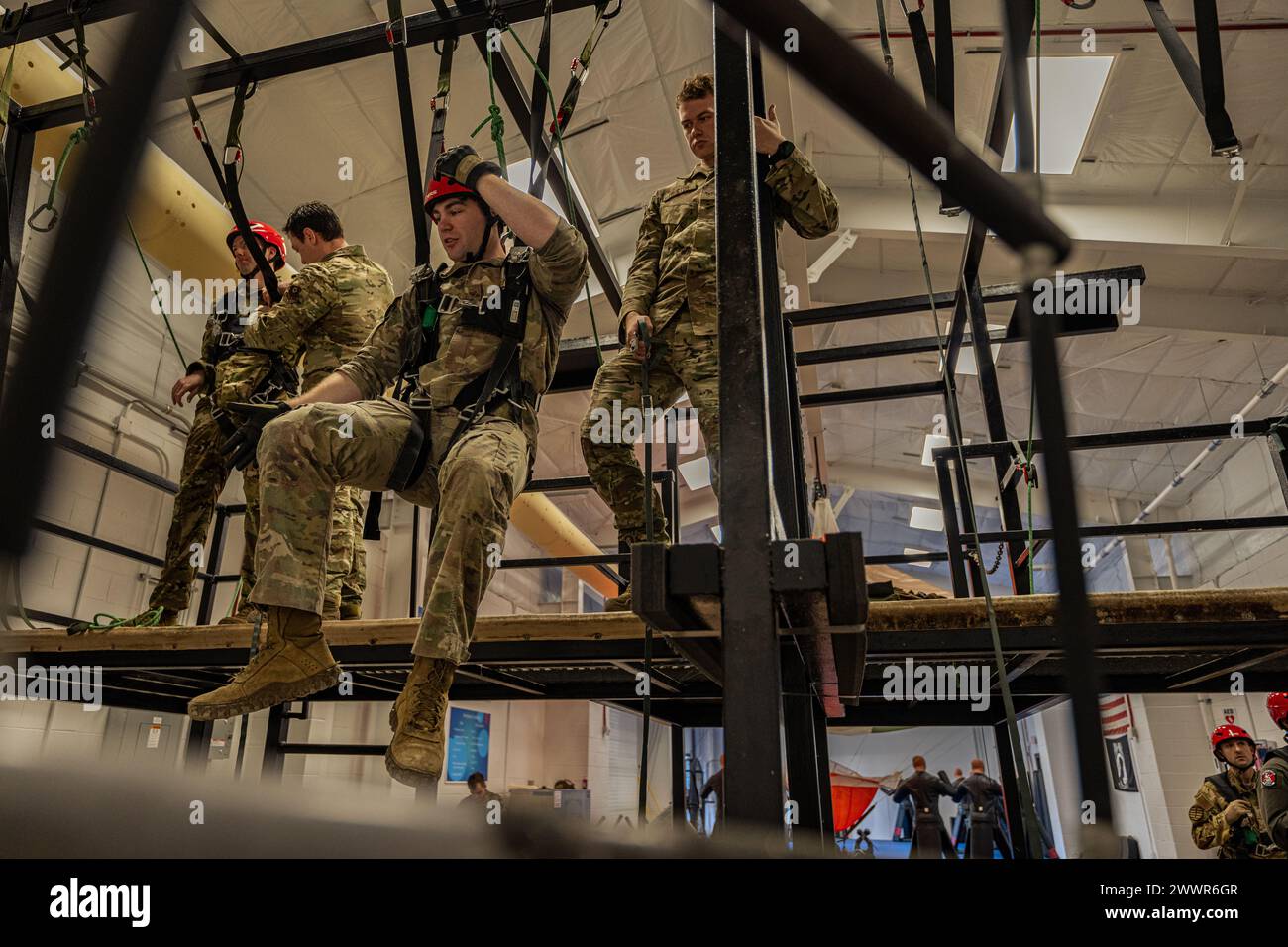 U.S. Air Force Airmen participate in an emergency parachute training at ...