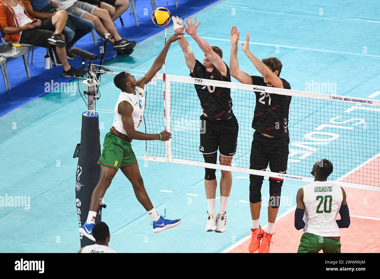Linus Weber, Tobias Krick (Germany), blocking against Cameroon ...