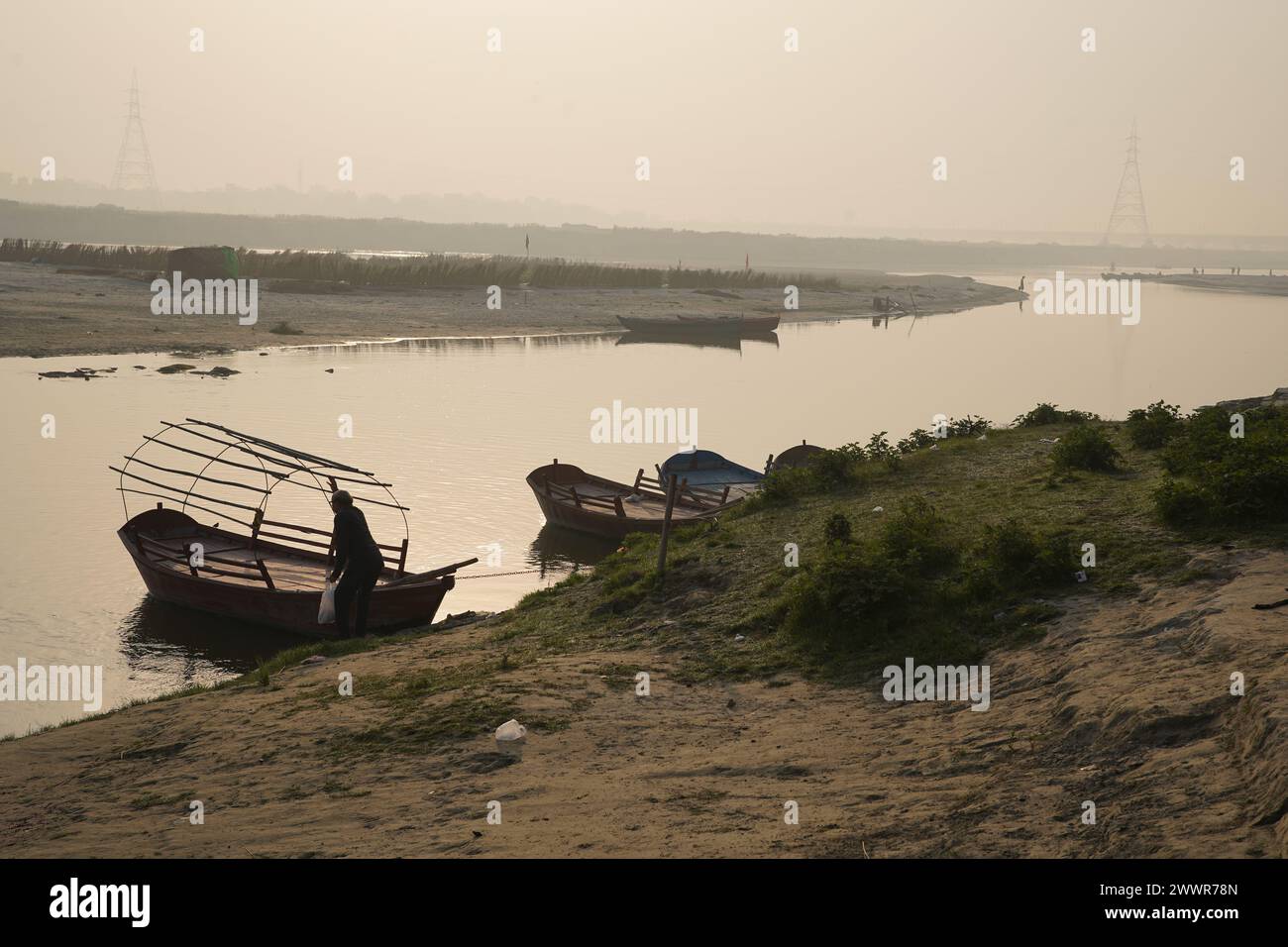The Ganges with floating boats near Guptar Ghat or Narayan Ghat. Civil Lines, Kanpur, Uttar ...
