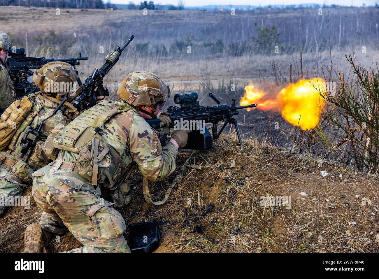 U.S. Army Spc. Phillip Garvin, right, attached to 3rd squadron, 2nd ...