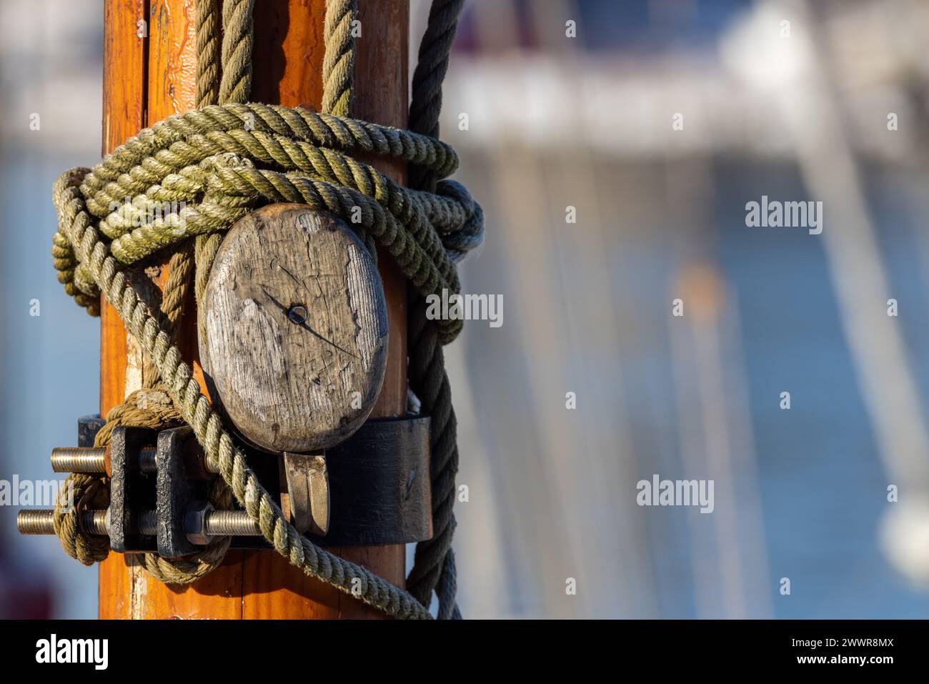 Mast rope and pulley on old sailing boat Stock Photo - Alamy