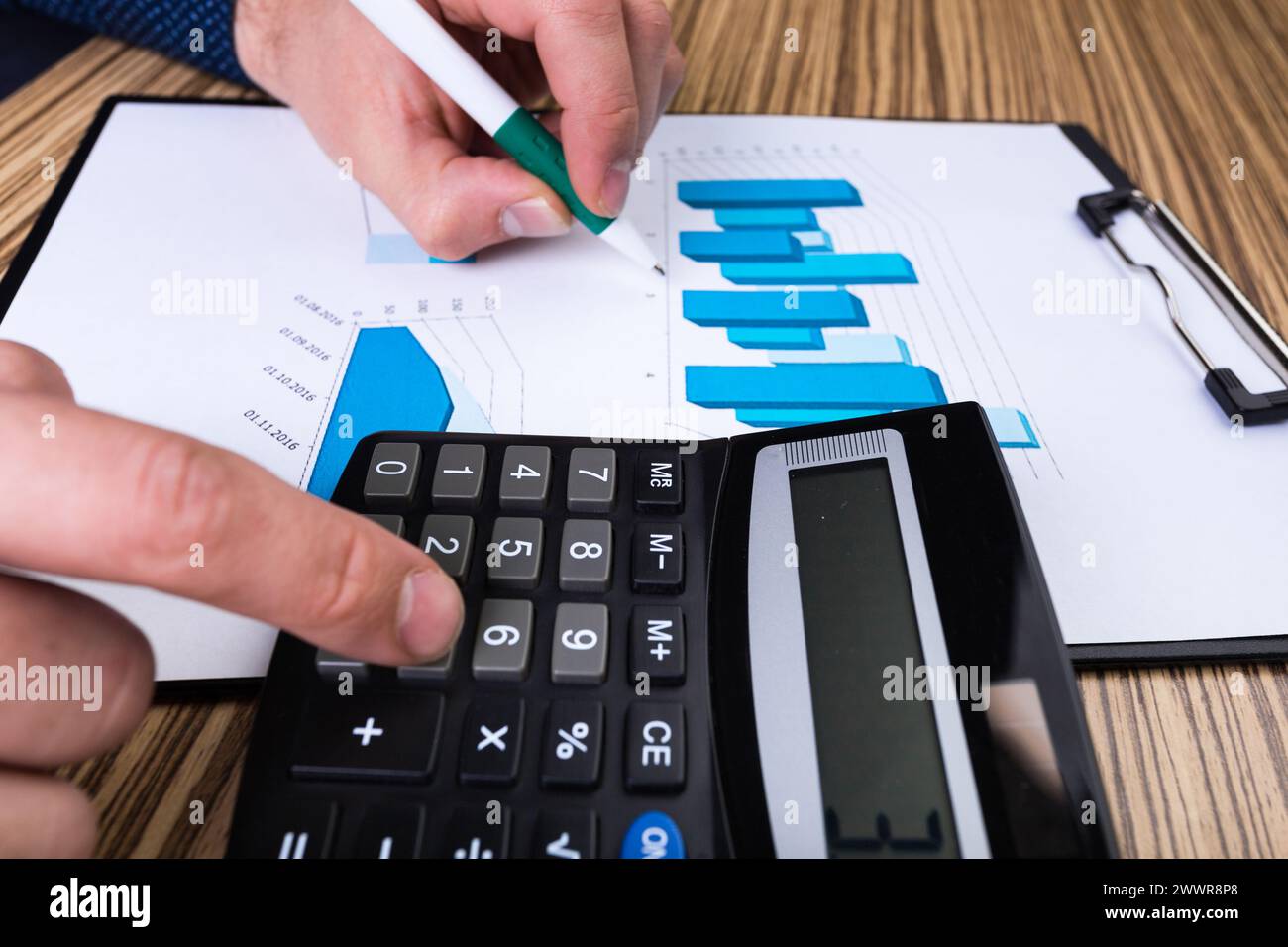 Graphs and Calculator Stock Photo - Alamy