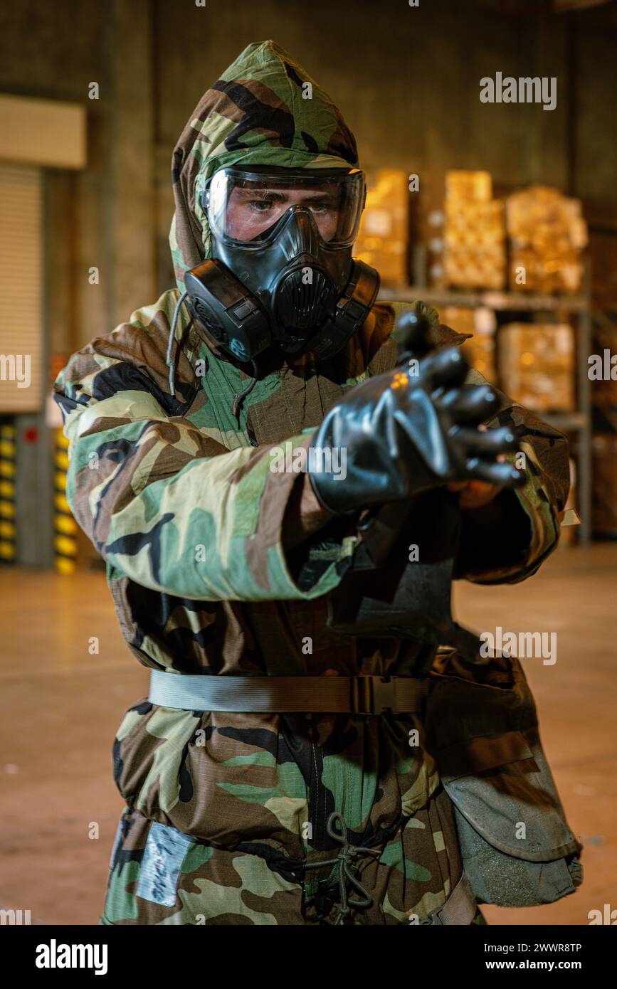 U.S. Marine Corps Pfc. Damon Mangels, a chemical, biological ...