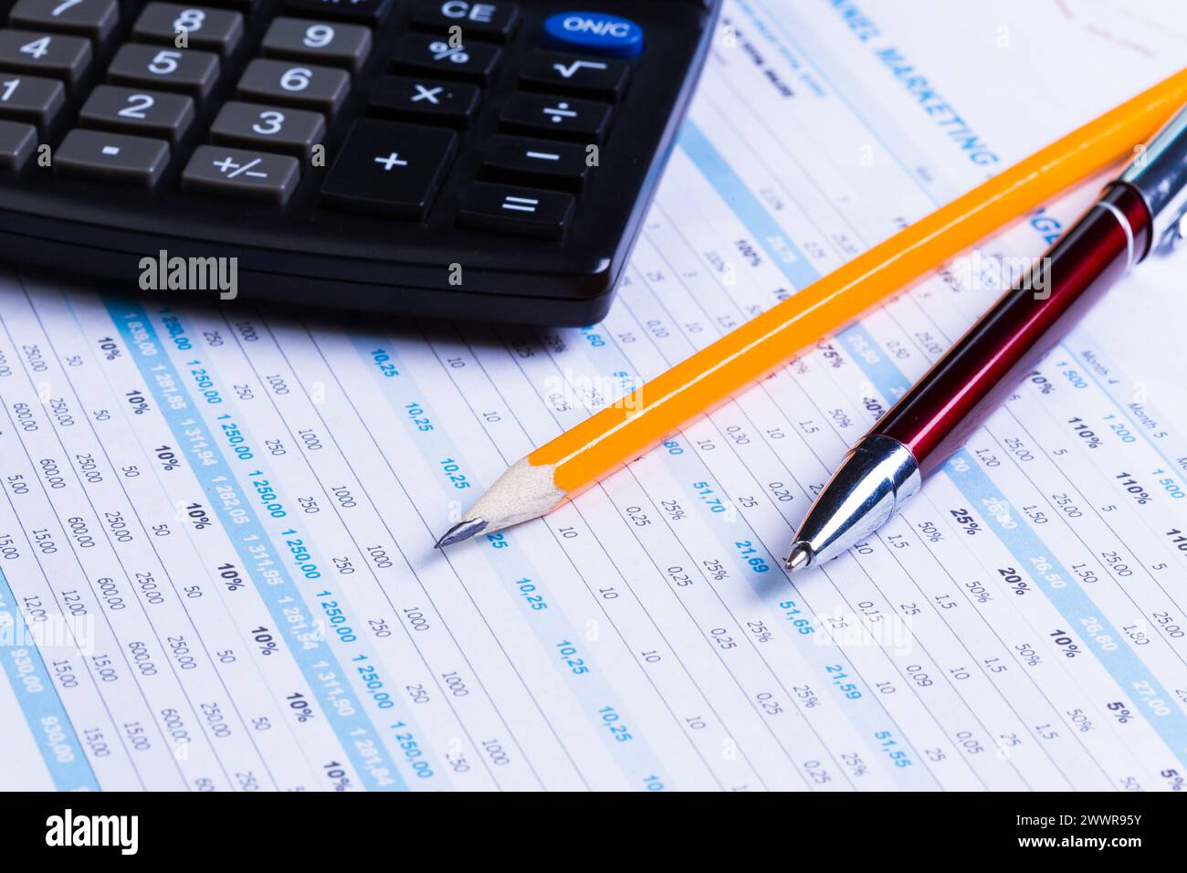 Graphs and Calculator Stock Photo - Alamy