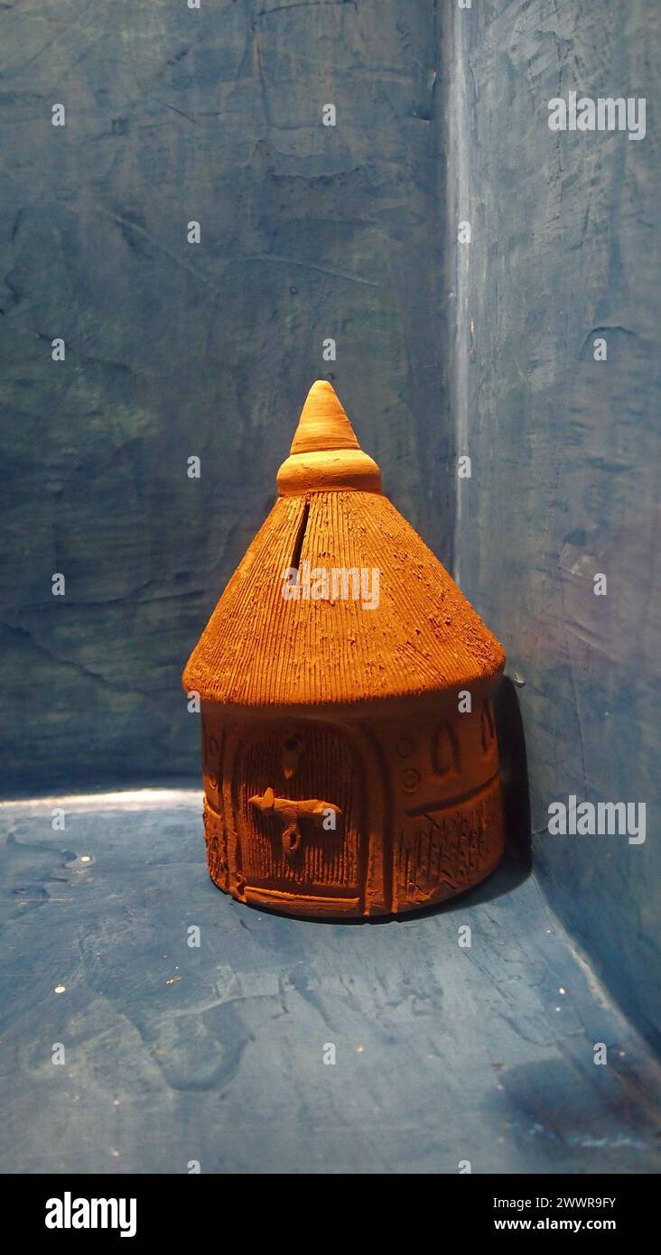 Clay money box Stock Photo - Alamy