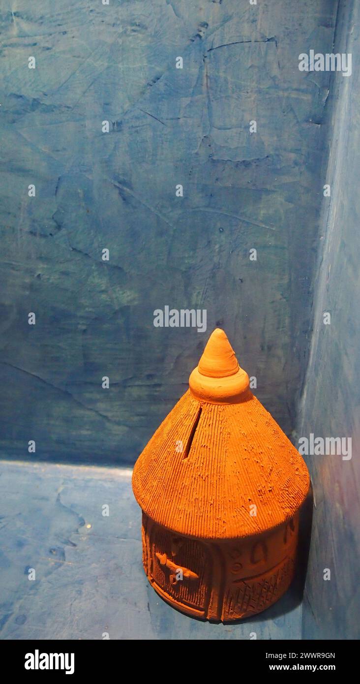 Clay money box Stock Photo - Alamy