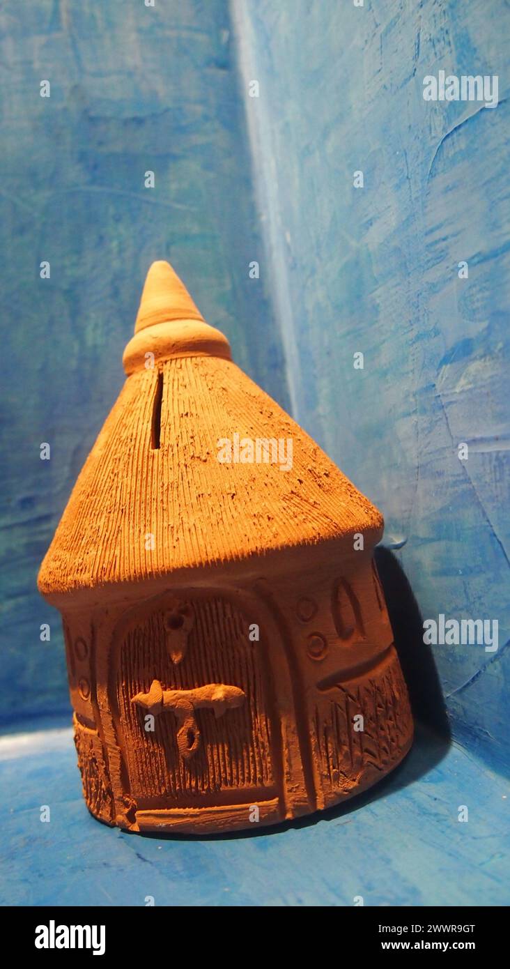 Clay money box Stock Photo - Alamy
