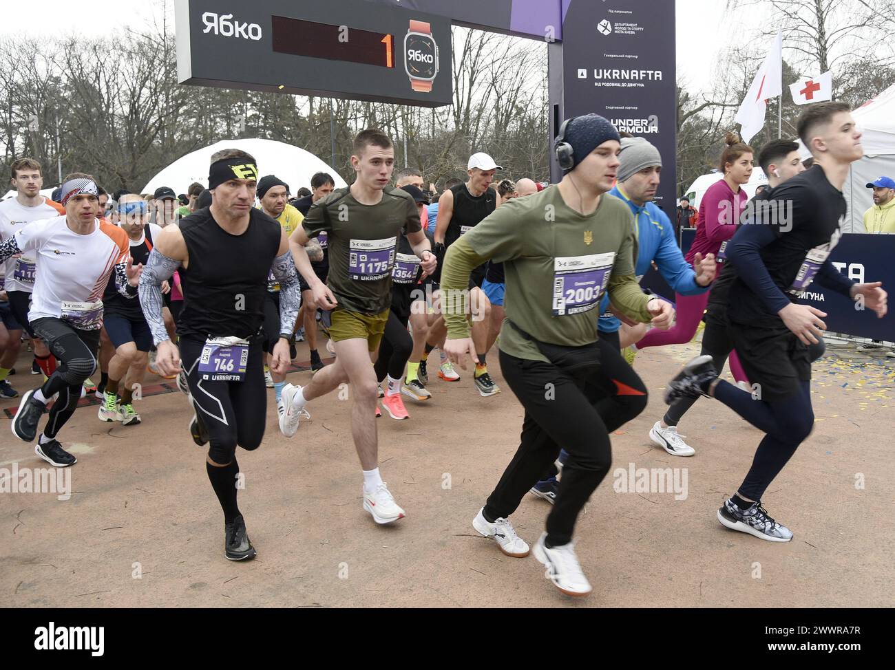 Non Exclusive: KYIV, UKRAINE - MARCH 24, 2024 - Runners take off during ...