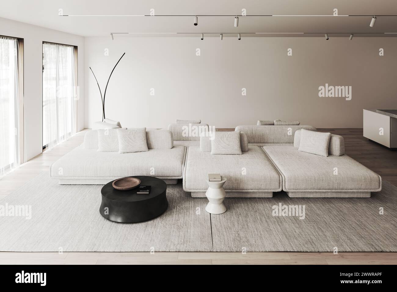 Expansive modern living room interior with a large comfortable sofa ...