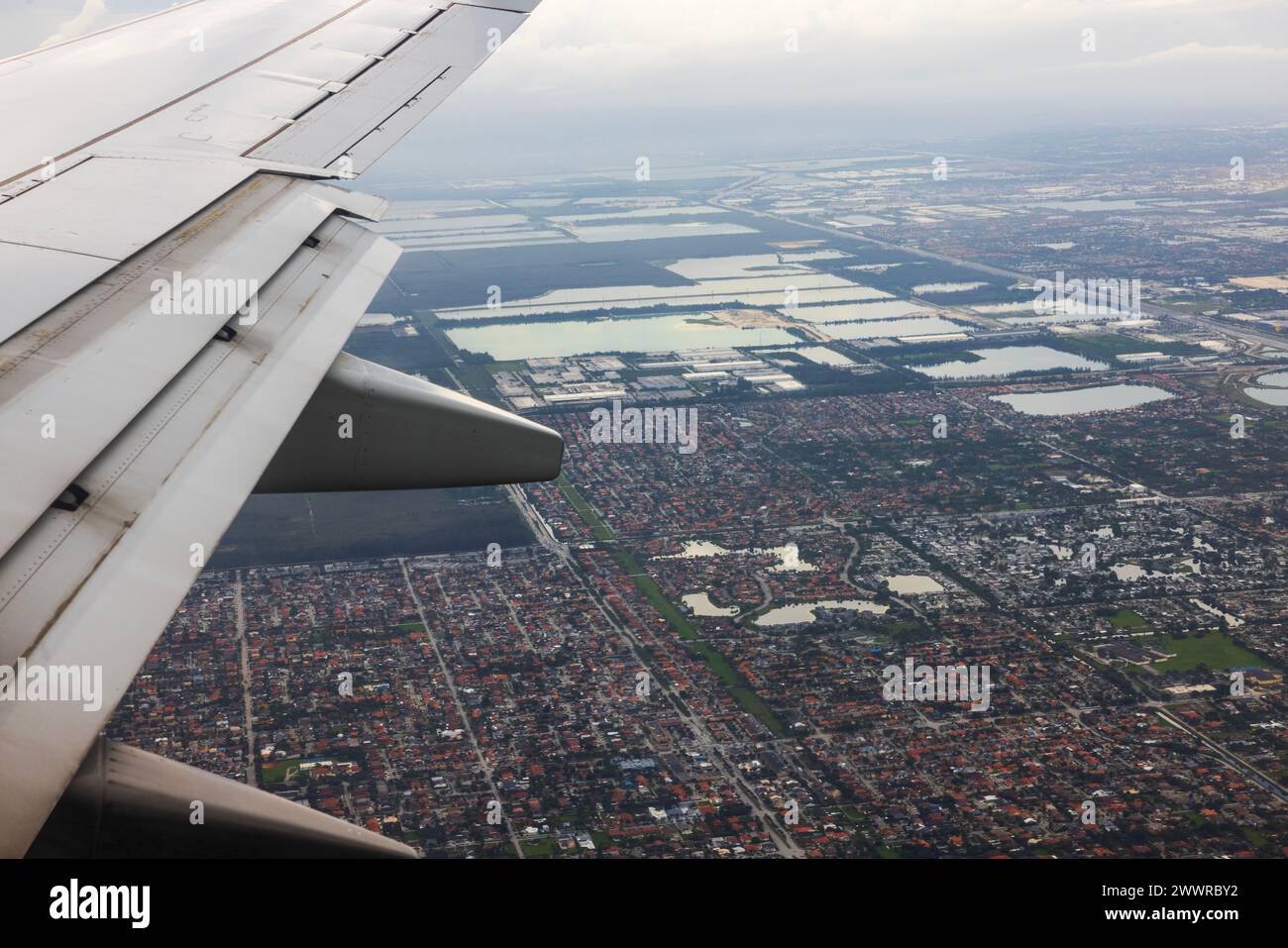 A beautiful view from the airplane window of the city of Miami during ...
