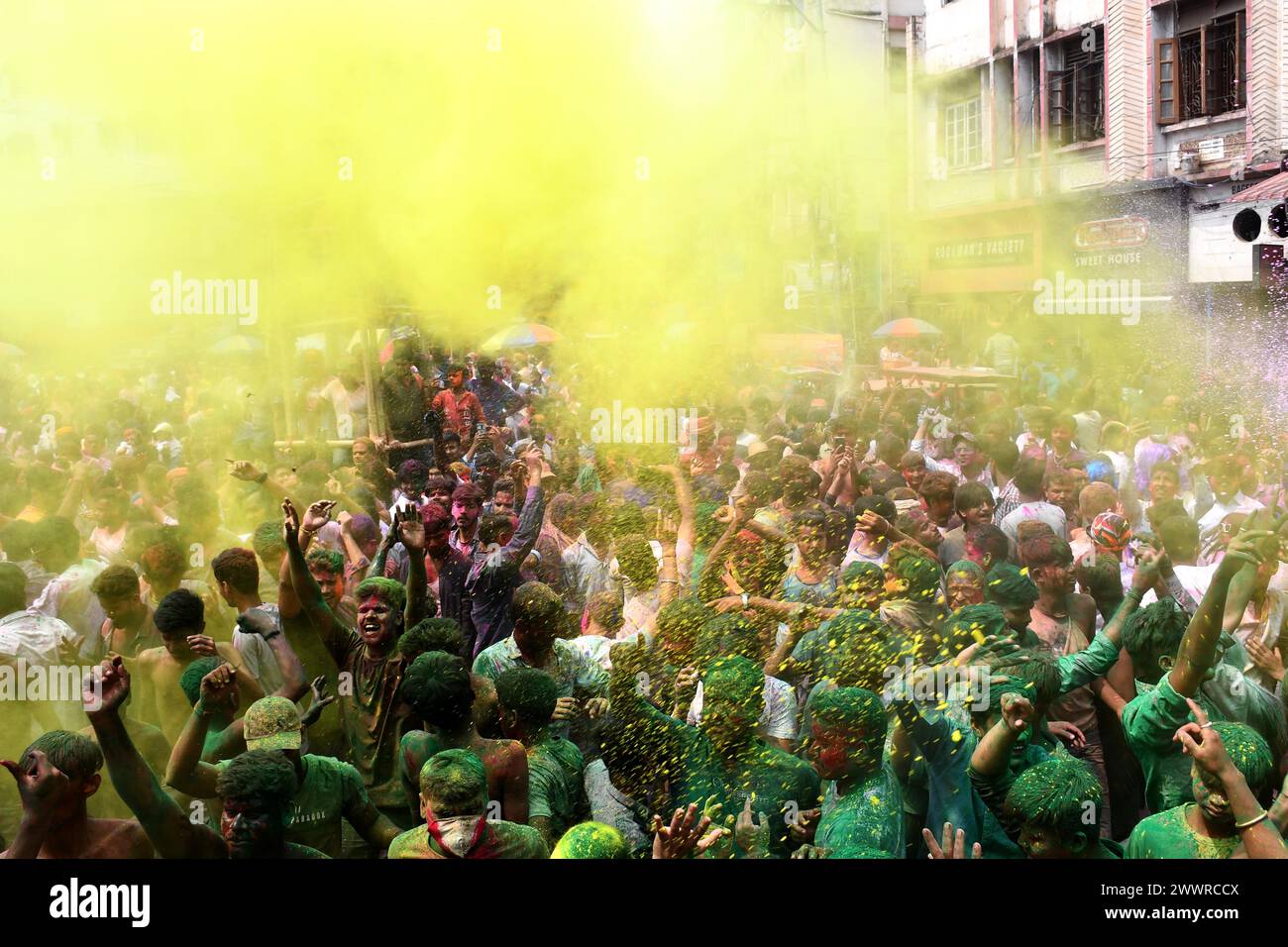 Guwahati, India. 25th Mar, 2024. People celebrate the Holi festival in ...
