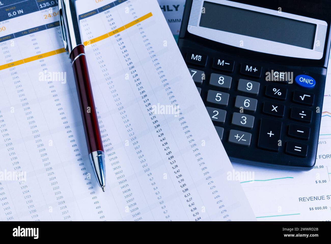 Graphs and Calculator Stock Photo - Alamy