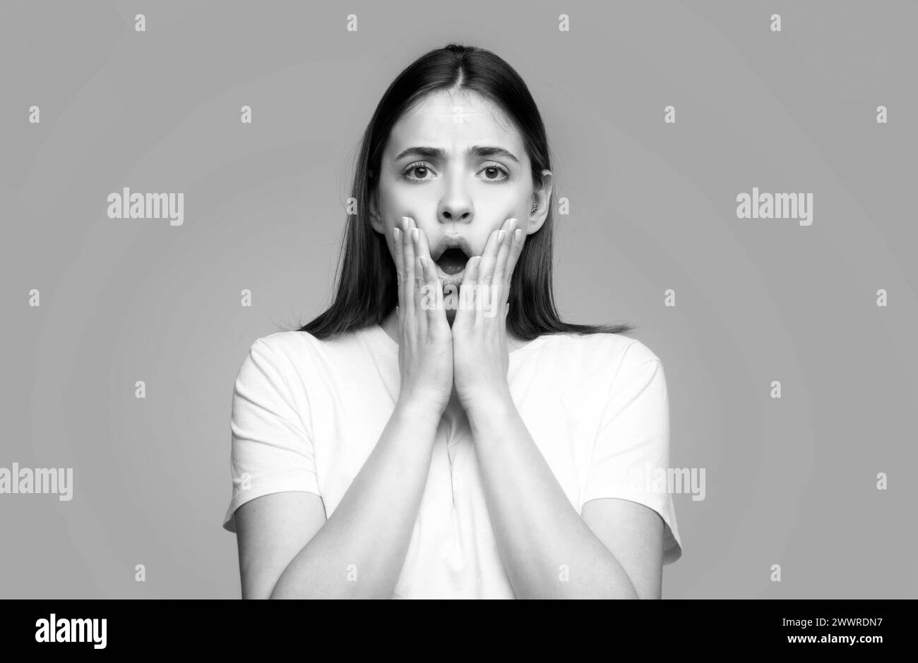 Shocked face of young woman. Funny female shocked face expression ...