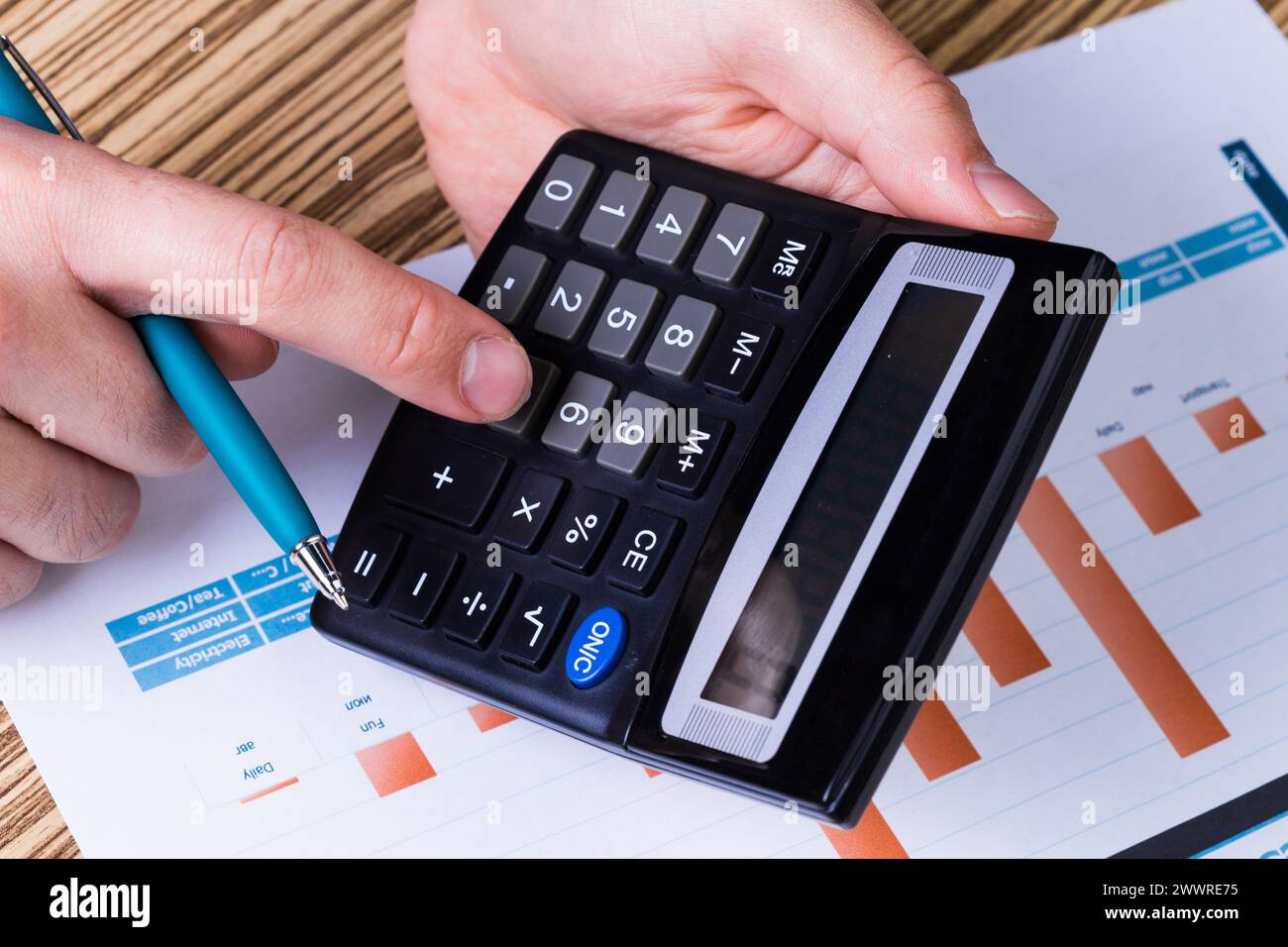 Graphs and Calculator Stock Photo - Alamy